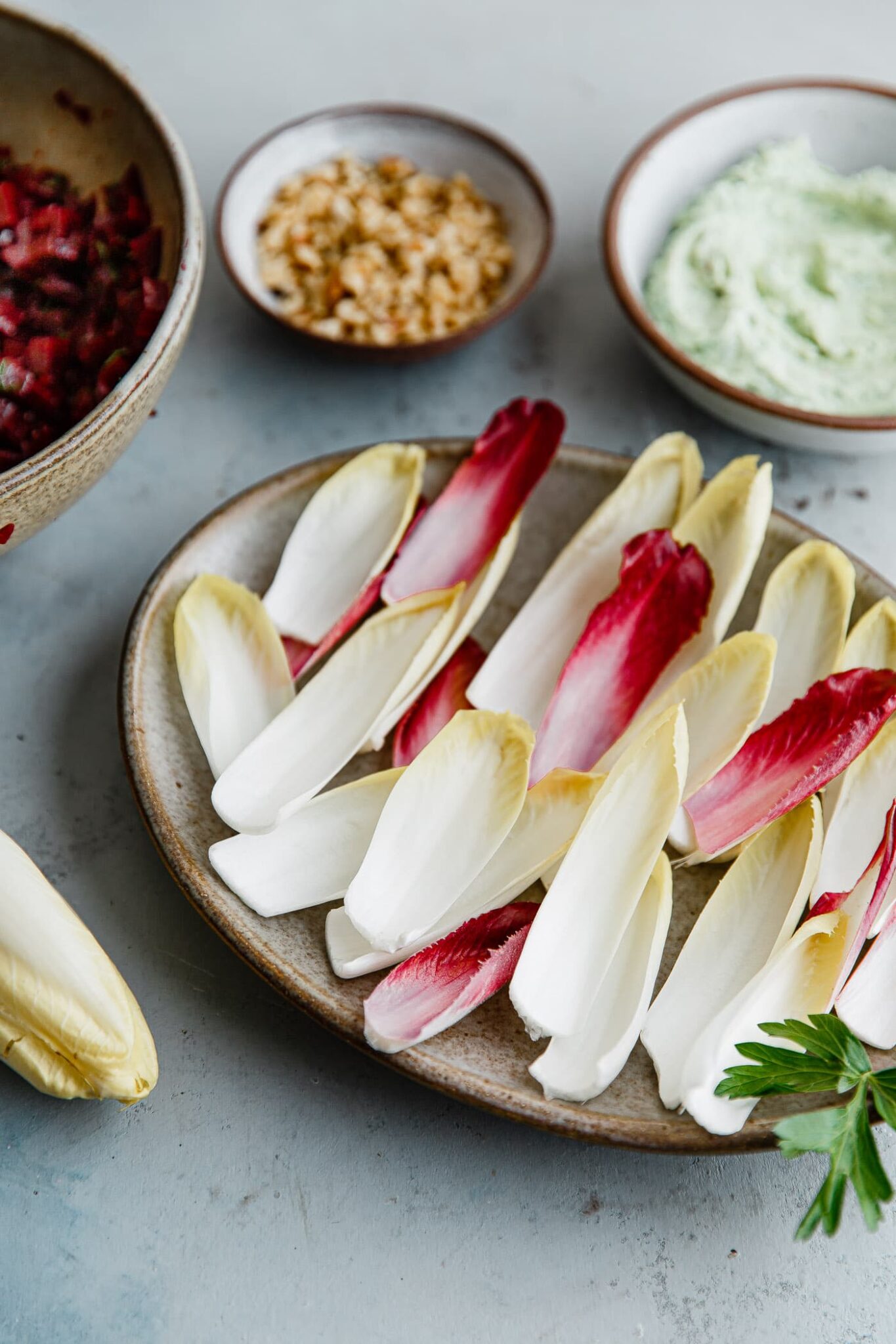 Beet and Goat Cheese Endive Bites - A Beautiful Plate